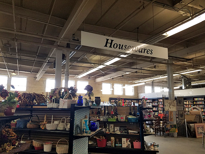 Under the "Housewares" sign lies the land of kitchen possibilities, where your grandmother's favorite serving dish awaits rediscovery.