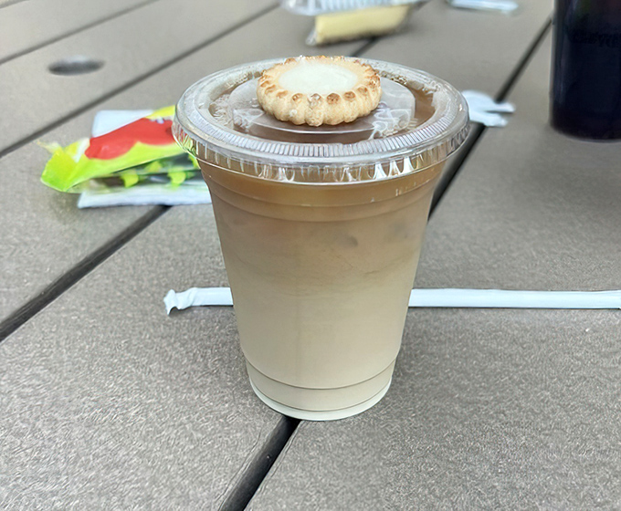 The perfect pairing! An iced coffee topped with a key lime cookie creates a caffeine-citrus combo that's basically Florida in a cup.