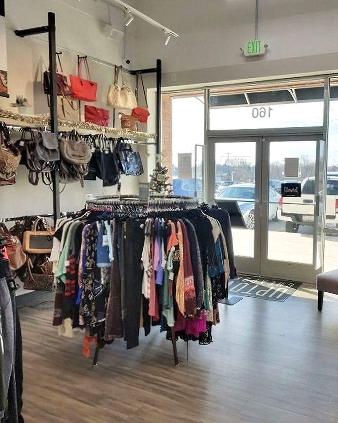 The entrance area welcomes fashion explorers with handbags overhead, like fashionable stalactites in this style cave of wonders.