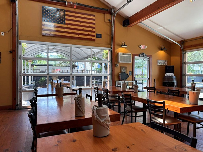 Wooden beams, warm lighting, and that American flag create the perfect backdrop for serious barbecue contemplation.