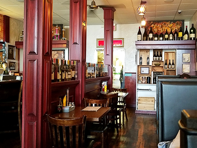 Rich mahogany, warm lighting, and enough wine bottles to suggest they take your pleasure seriously. Dining rooms with this much character should charge rent. 