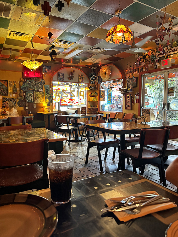 Stained glass light filters through colorful ceiling tiles, creating the feeling you've stumbled into the world's most delicious kaleidoscope.