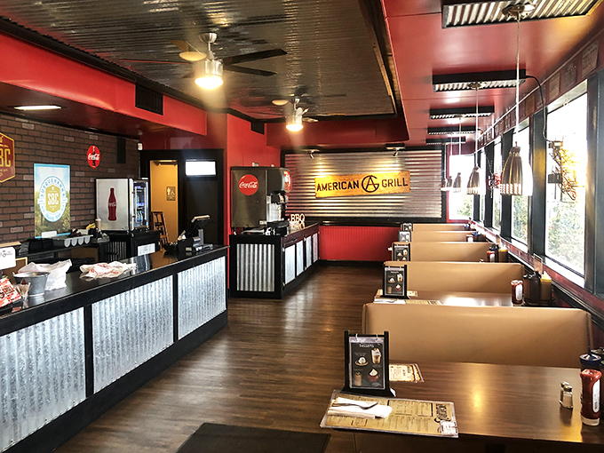 Red walls, corrugated metal, and warm wood tones&mdash;the BBQ trifecta of interior design. You know you're in the right place when the d&eacute;cor matches the food.