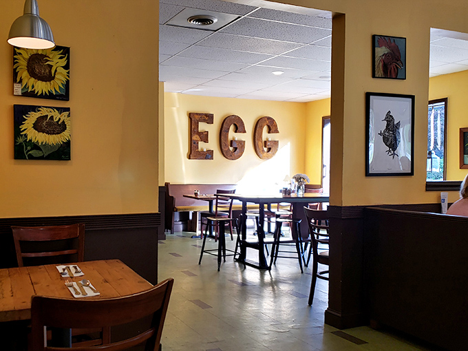 The "EGG" sign isn't just decor&mdash;it's a three-letter promise of breakfast excellence that this sunny yellow room delivers on daily.