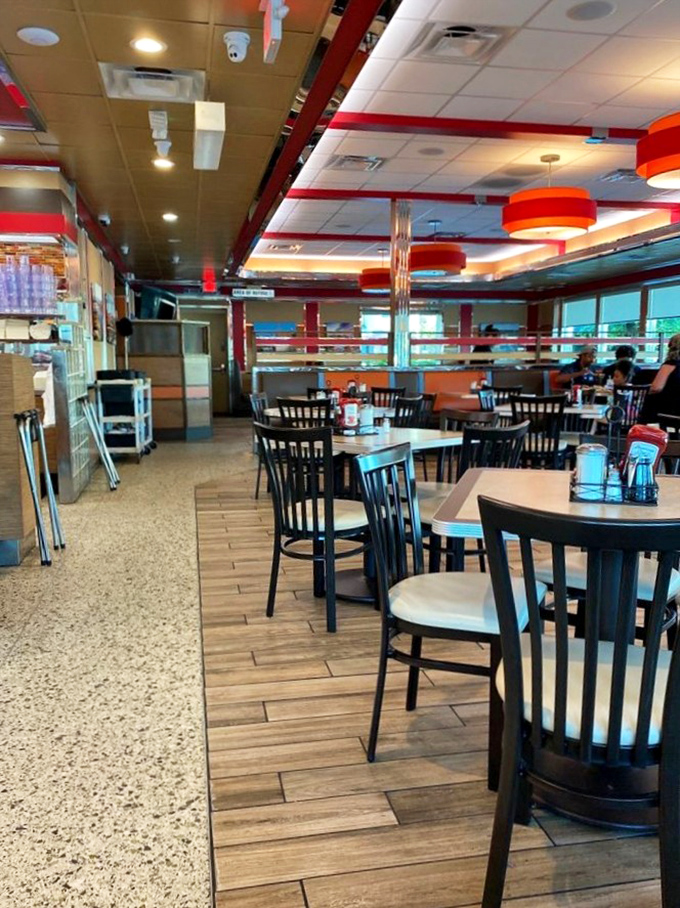 The spacious dining room buzzes with the kind of energy that only comes from truly satisfied customers.