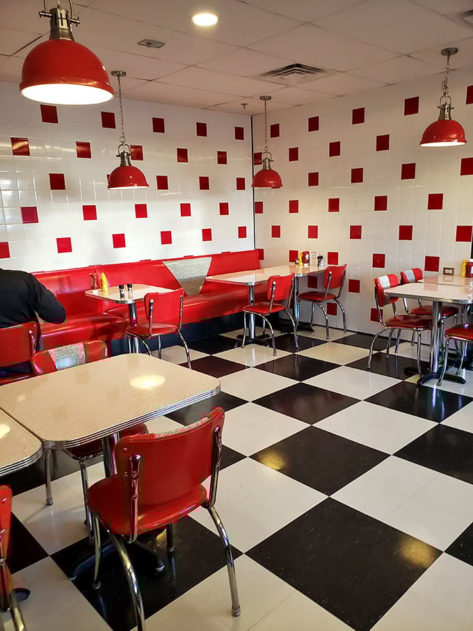 Red pendant lights cast a warm glow over booths where countless first dates, family celebrations, and "just because" meals have unfolded.
