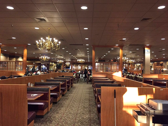 The dining room stretches like a promised land where hungry souls gather for serious eating business.