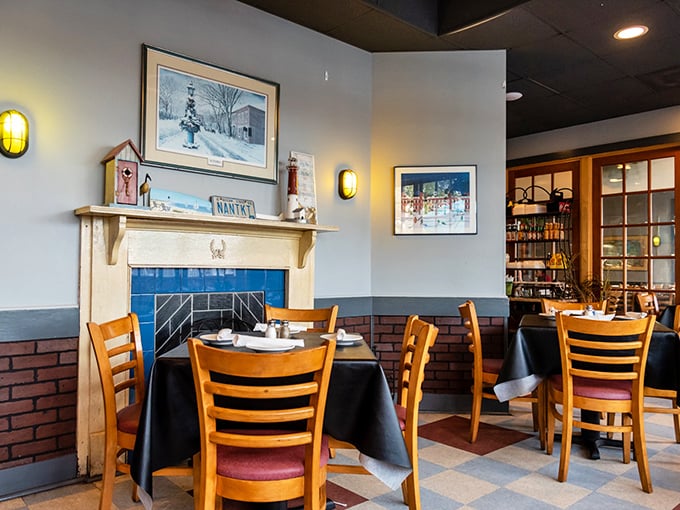 Cozy fireplace, nautical touches, and tables set for conversation. Nantucket's spirit captured perfectly in Chapel Hill.