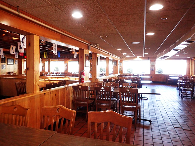 The dining room's warm wood tones and terra cotta floors create that rare space where both family celebrations and quiet date nights feel equally at home.