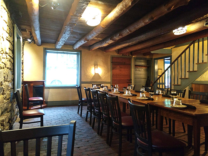 Exposed stone walls and wooden beams create the perfect backdrop for conversations that linger longer than dessert. History you can touch while you eat.