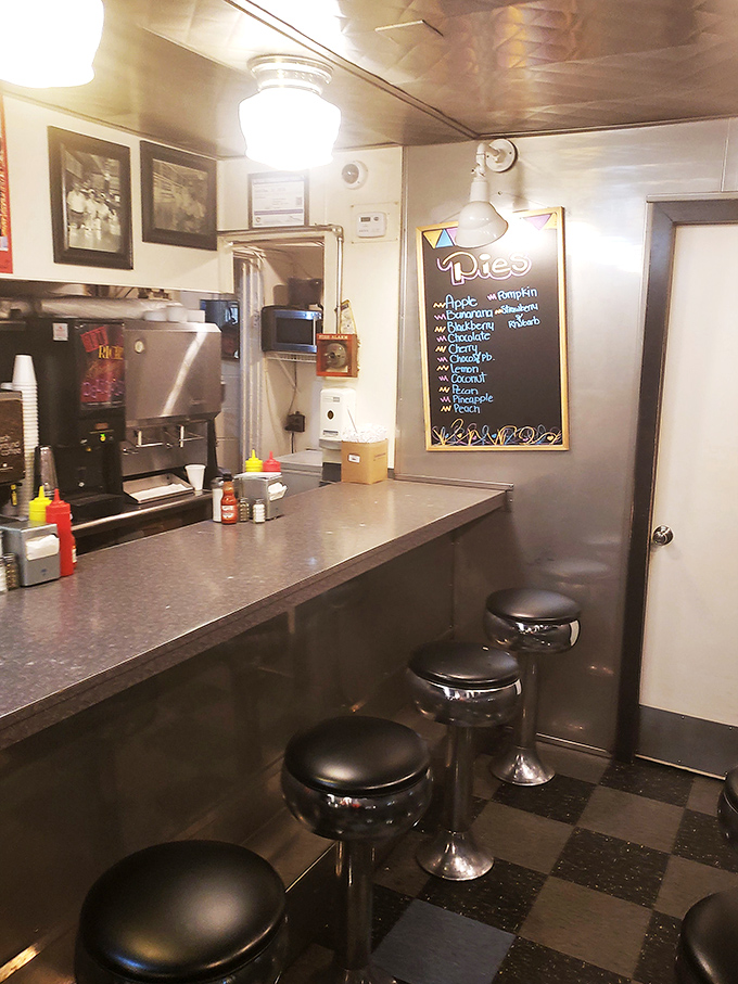 The counter view&mdash;where magic happens. That pie board in the background is the grown-up version of a toy store window.