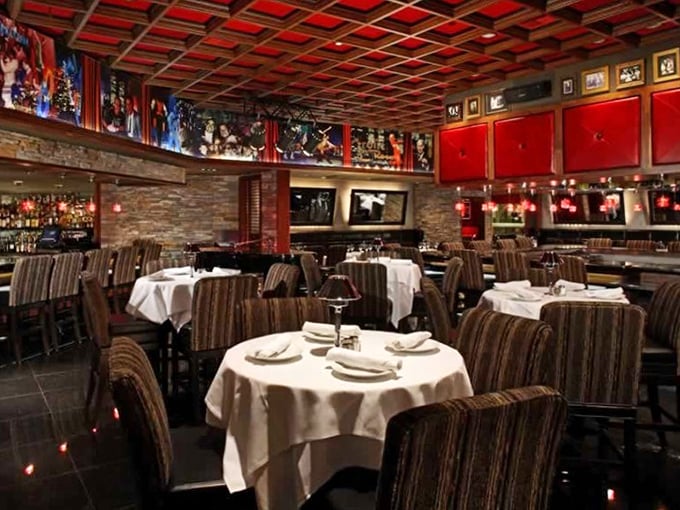 The dining room glows with that perfect amber light where everyone looks like they've just returned from vacation—even if they've just returned from the office.