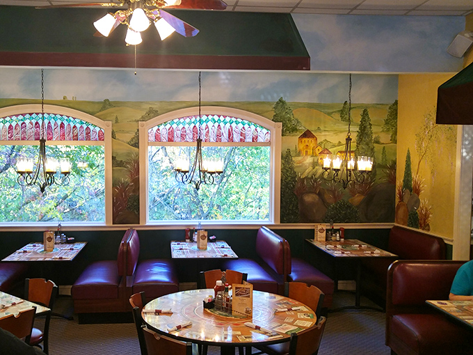 The dining room's mural transforms ordinary meals into Italian countryside escapes, proving ambiance is as important an ingredient as anything in the kitchen.