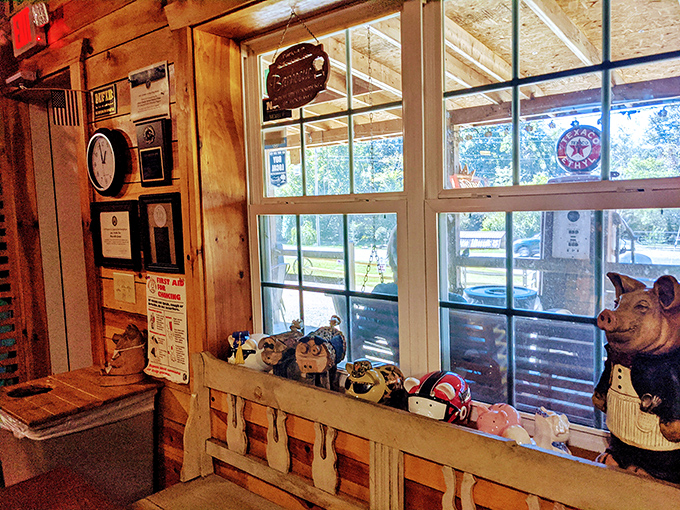 Pig figurines watching over diners like porcine guardian angels. The wood-paneled shrine to barbecue tradition feels like coming home.