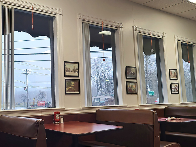 Large windows flood the dining room with natural light, creating the perfect backdrop for both serious breakfast deliberations and casual coffee catch-ups.