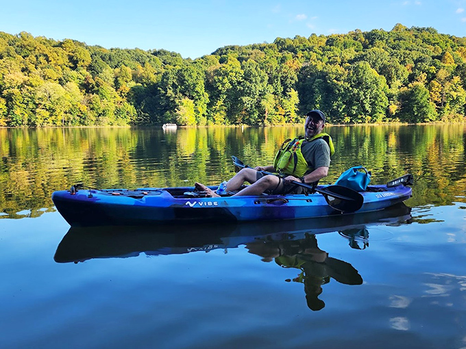 Floating therapy session with paddle included. Fall foliage creates nature's perfect backdrop for social media posts that actually deserve the likes.