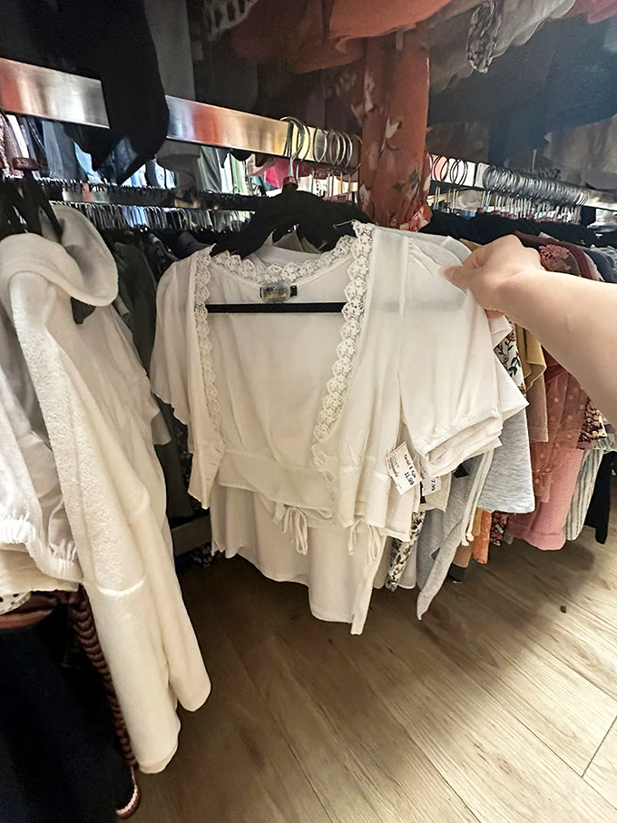 Delicate lace details on this top prove that elegant fashion doesn't require an elegant price point.