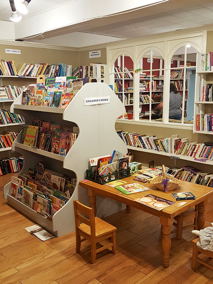 The children's book nook, complete with tiny table and chairs. Where little readers can test-drive stories before taking them home.