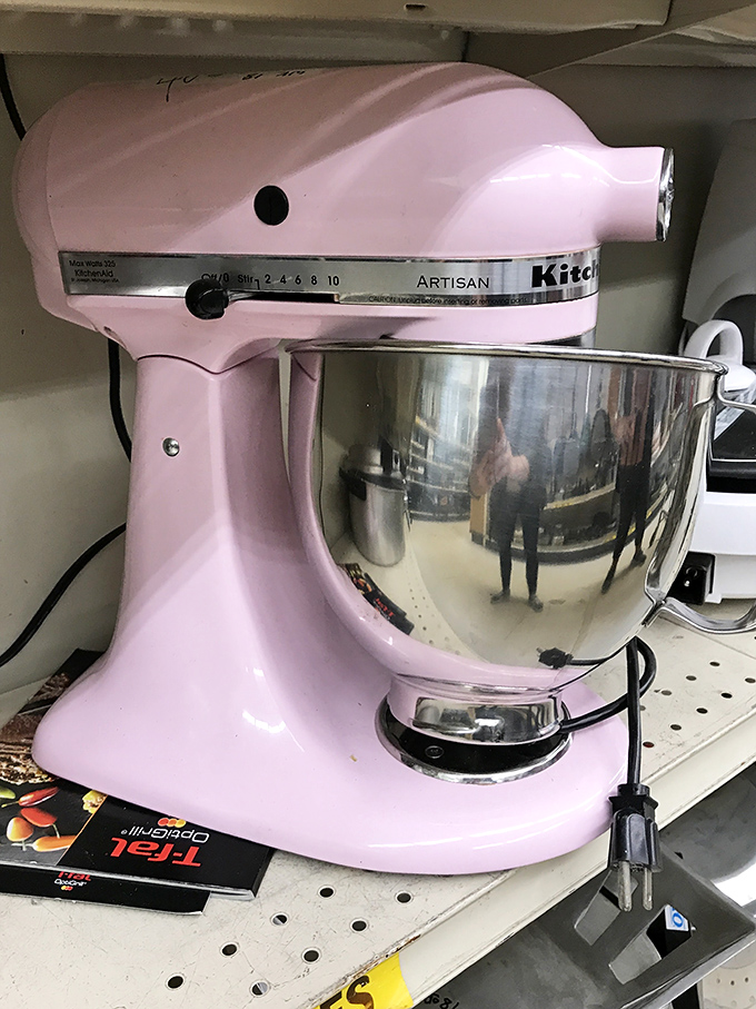 A pink KitchenAid mixer waits for its second act in someone's kitchen. Yesterday's splurge becomes today's steal.
