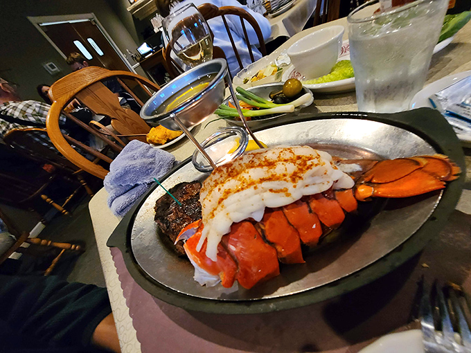 The surf and turf platter that launches a thousand special occasions, featuring a lobster tail that would make coastal restaurants envious.