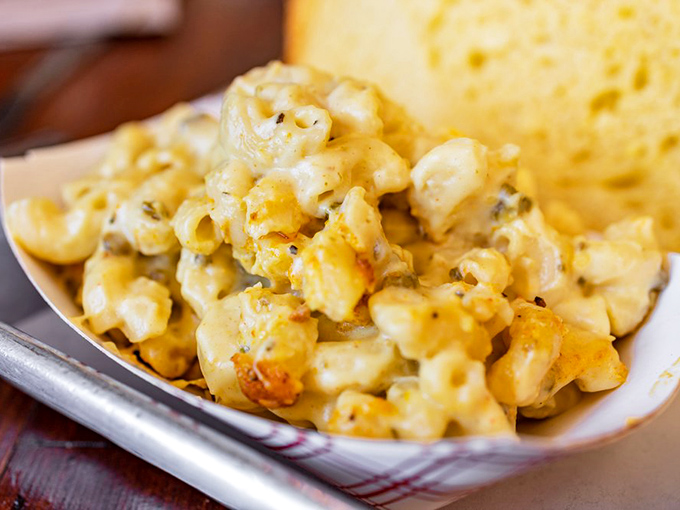 Mac and cheese so creamy and indulgent, it should come with its own warning label and possibly a tiny pillow for the nap you'll need after.