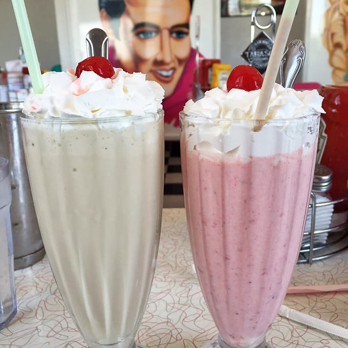 Milkshakes so thick they're practically standing at attention, topped with whipped cream mountains that deserve their own zip code.