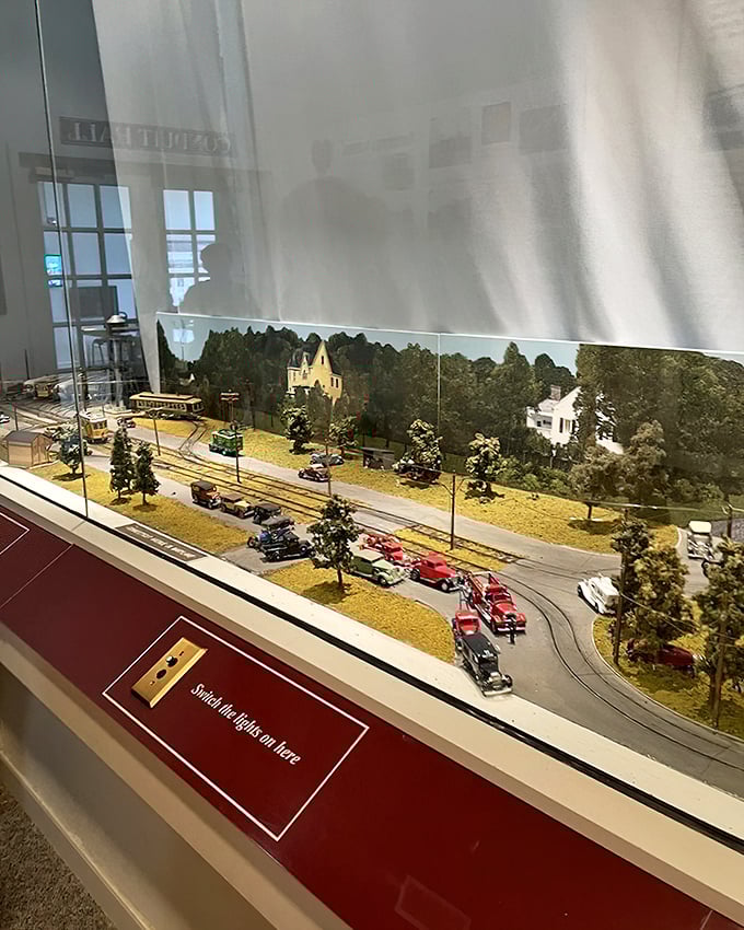 A charming miniature streetscape shows how trolleys once dominated American roads. Look closely&mdash;every tiny automobile tells part of the story!
