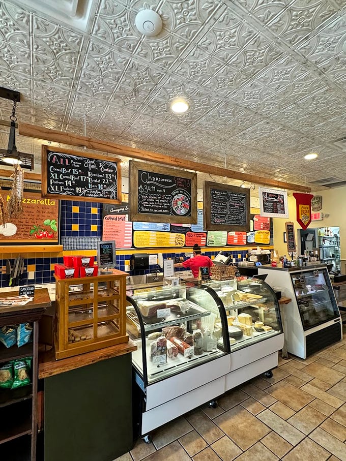 Behind this counter, sandwich artists perform their daily magic. The display case holds treasures more valuable than gold&mdash;cheese and salads.