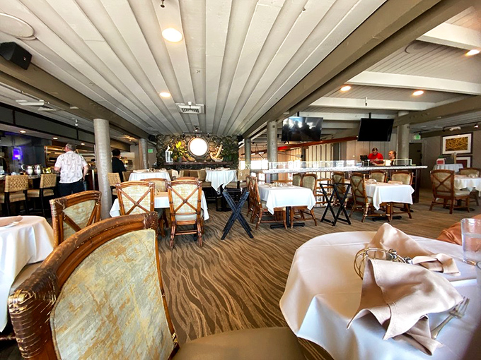White tablecloths, rattan chairs, and ocean views&mdash;this isn't just a dining room, it's California coastal elegance personified.