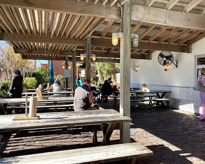 Outdoor dining that captures the essence of laid-back Florida living. The covered seating area offers shade while you contemplate your next seafood conquest.