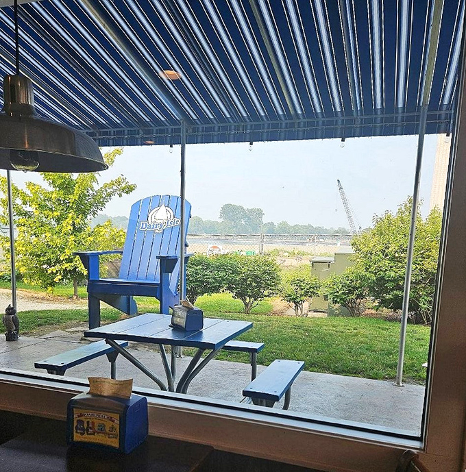 That signature blue Adirondack chair framed by Lake Erie's vastness is practically begging for your social media moment. #IslandLife