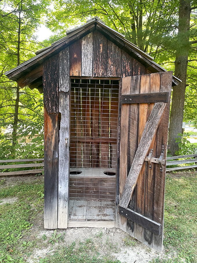 The pioneer outhouse—where our ancestors contemplated life without smartphones or plumbing, yet somehow survived just fine.