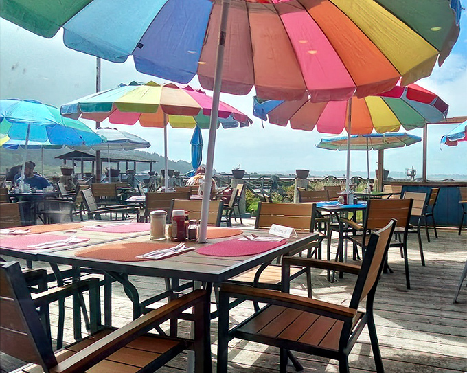 Outdoor dining under rainbow umbrellas &ndash; because sometimes great seafood tastes even better with a side of vitamin D and ocean breeze.