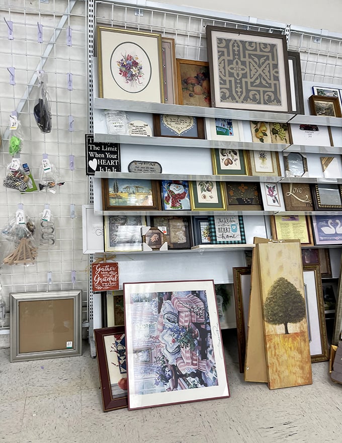 The art wall: where hotel room landscapes and genuine hidden gems compete for wall space in your home office.