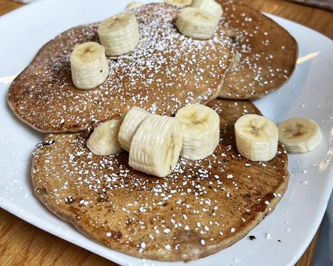 Banana pancakes that make you wonder if Elvis himself would approve&mdash;a stack of morning glory topped with fruit and powdered sugar confetti. 