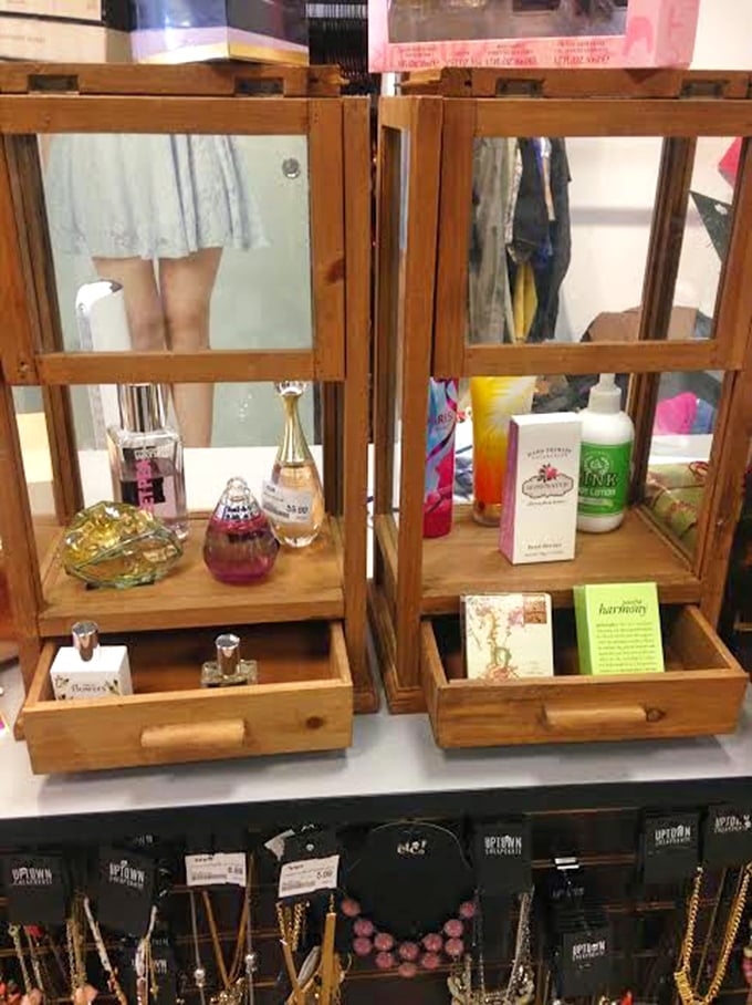 Fragrance displays that transform "I can't believe it's not new" into "I can't believe how much I saved" with each elegant bottle.