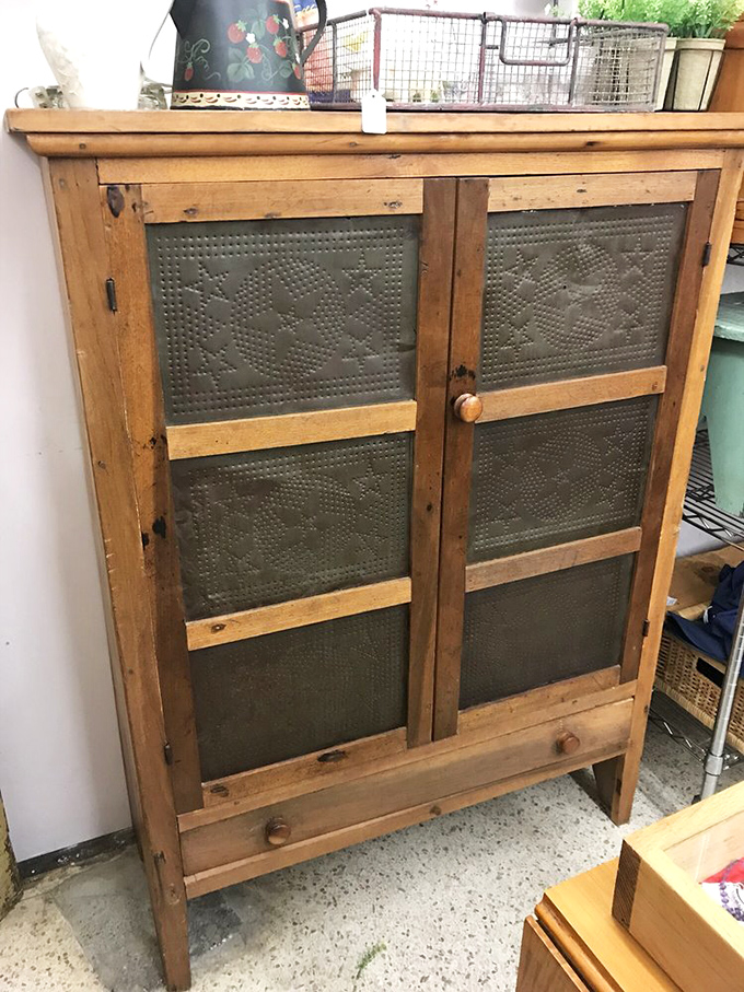 Not just a pie safe but a conversation piece with its punched tin panels. Grandma's recipes deserve nothing less than this handcrafted guardian.