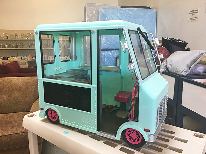 Childhood dreams at bargain prices! This mint-green toy truck proves one shopper's outgrown treasure becomes another's perfect grandparent-of-the-year gift.