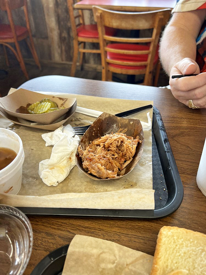 Pulled pork that's had a proper introduction to smoke and spice. Each strand tells a story of patience and proper technique.