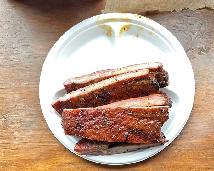 These ribs have that perfect mahogany bark that makes barbecue lovers weak in the knees. The kind of food that demands a moment of respectful silence.