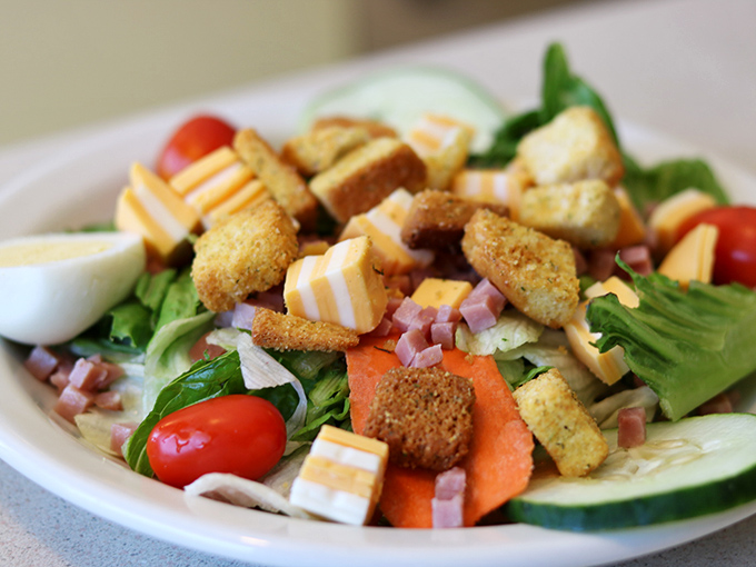 A salad that doesn't apologize for being colorful and fresh, proving that diners can do vegetables with the same conviction as their comfort classics.