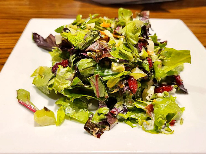 A garden-fresh salad that provides the perfect intermission between seafood acts, dotted with cranberries for that touch of New England authenticity.