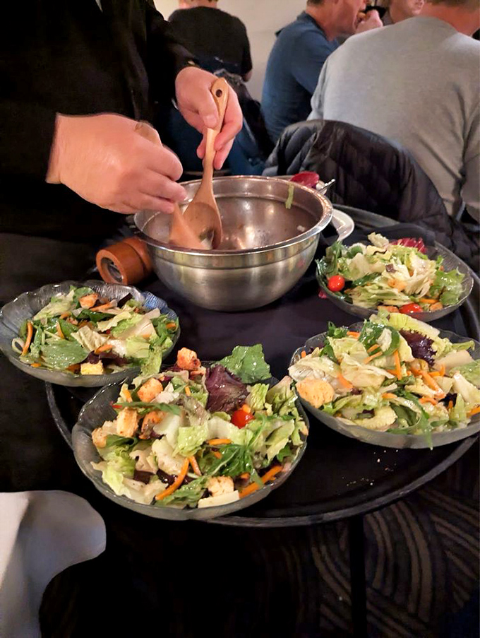 House salads prepared tableside&mdash;a refreshing ritual that reminds us some traditions, like impeccable service, never go out of style.