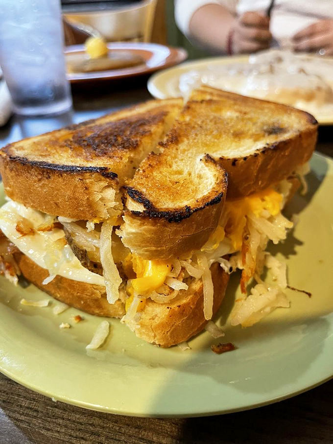 This golden-grilled sandwich with its cascade of melted cheese is sending me "I'm delicious" signals that cannot be ignored.