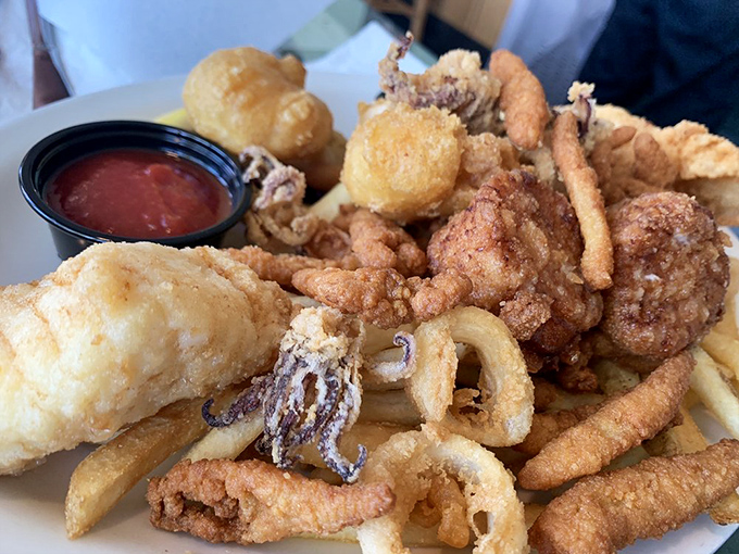 A crispy carnival of fried seafood goodness. This platter doesn't just feed your hunger&mdash;it throws a party for your taste buds.