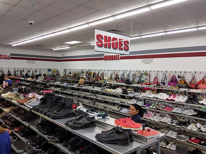 The shoe section – where your next favorite pair is hiding between someone else's fashion mistakes. Those pink sneakers are practically screaming for attention.