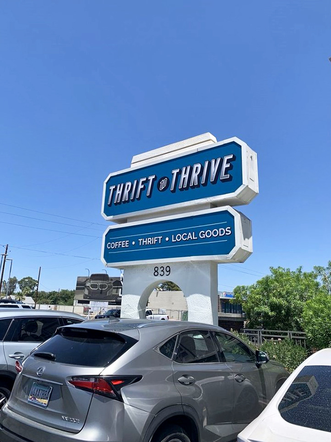 The retro-cool sign stands tall against Arizona's impossibly blue sky. Like a lighthouse for the bargain-obsessed, guiding shoppers safely to shore.