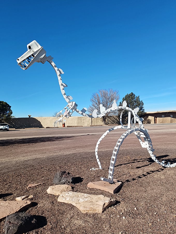 This skeletal dino sculpture proves that even in the afterlife, prehistoric creatures can still strike a pose with metallic panache.