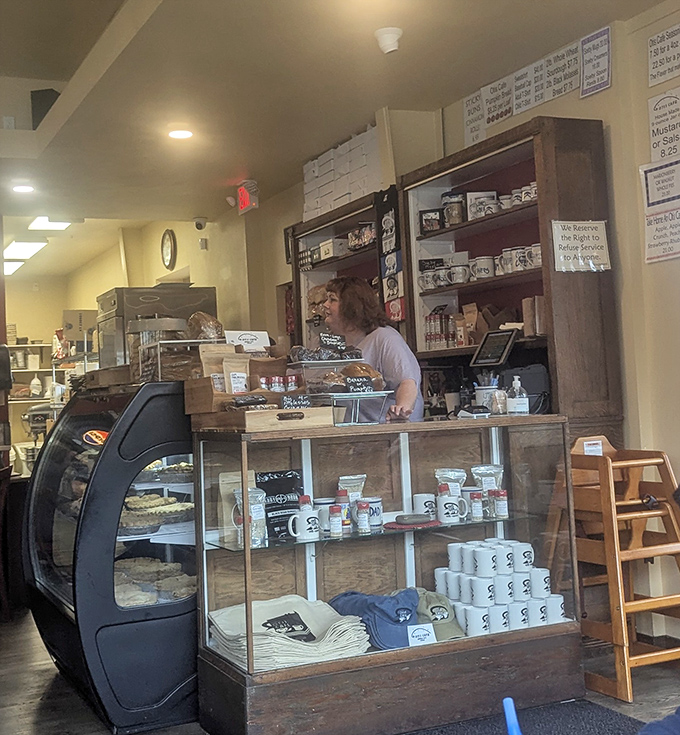Where the magic happens—a glimpse behind the counter where homemade goodness is crafted daily with practiced hands.
