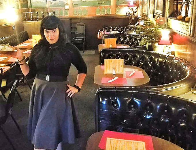 The dining room's curved booths aren't just comfortable – they're conversation incubators where strangers become friends over garlic bread.